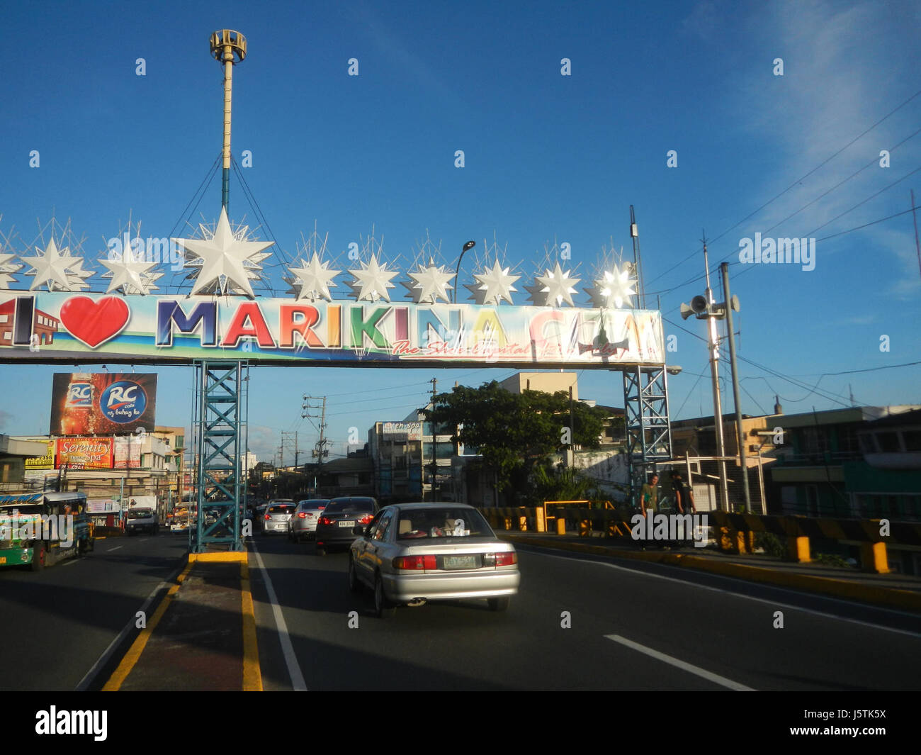 A photograph of the Marikina Bridge over the Marikina River, showcasing ...