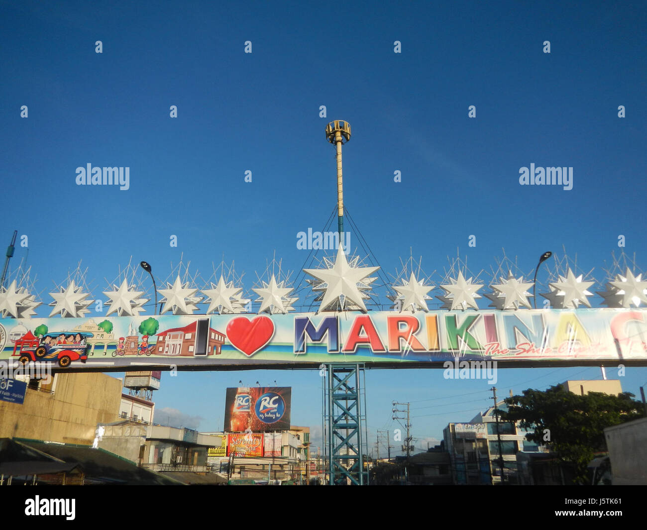 This image shows the Marikina Bridge, spanning the Marikina River in ...