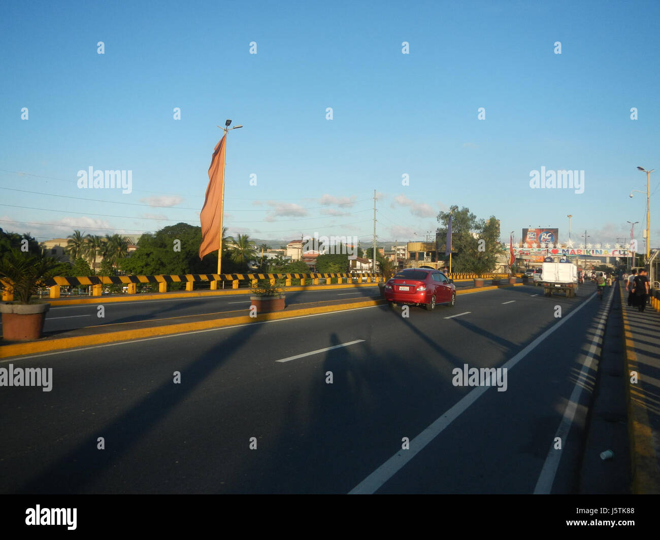 This photograph depicts the Marikina City Bridge over the Marikina ...