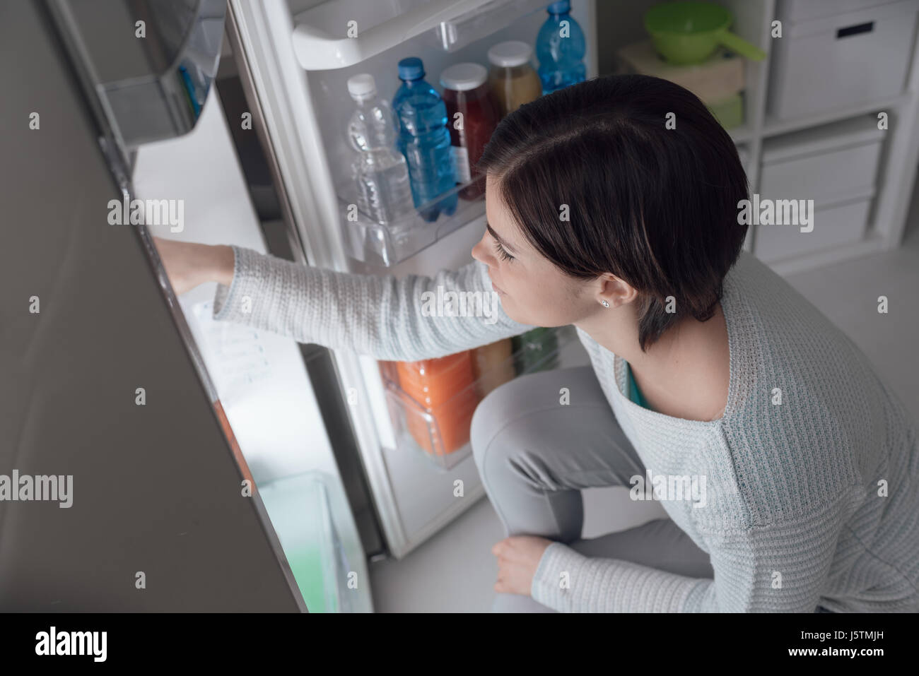 Taking food out freezer hi-res stock photography and images - Alamy