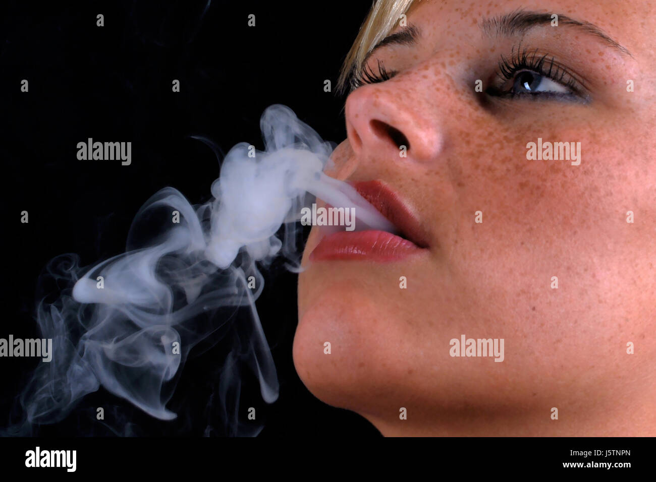woman smoke smoking smokes fume insalubrious freckles cancer young ...