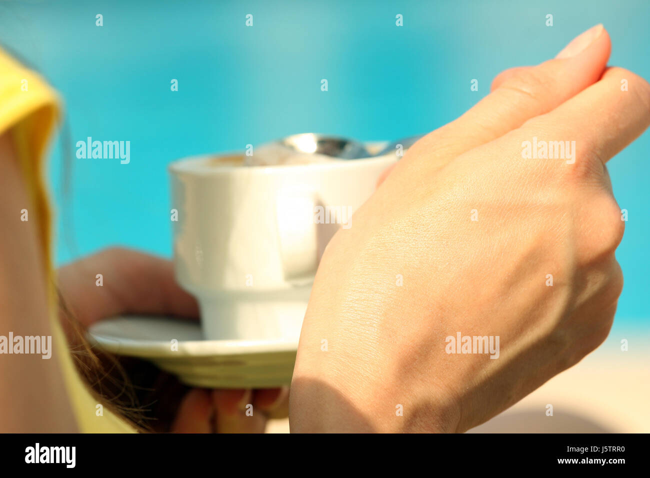 cup of coffee in hand Stock Photo - Alamy