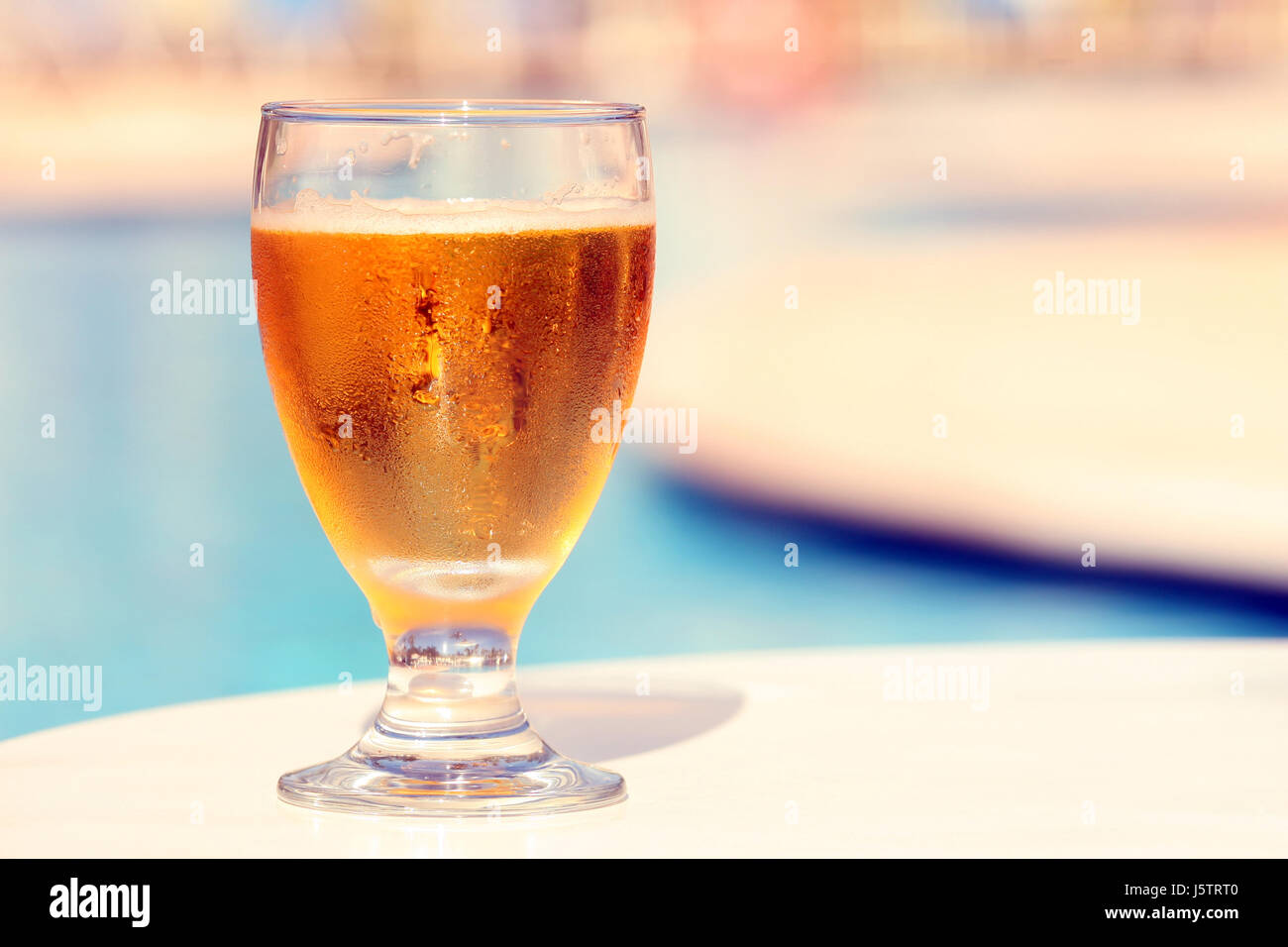 beer glass on the table Stock Photo - Alamy