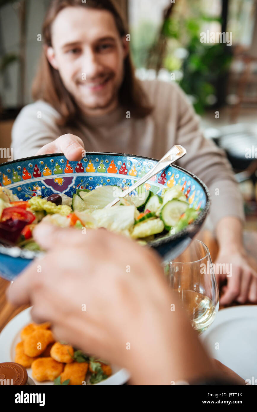Passing food dinner table hi-res stock photography and images - Alamy