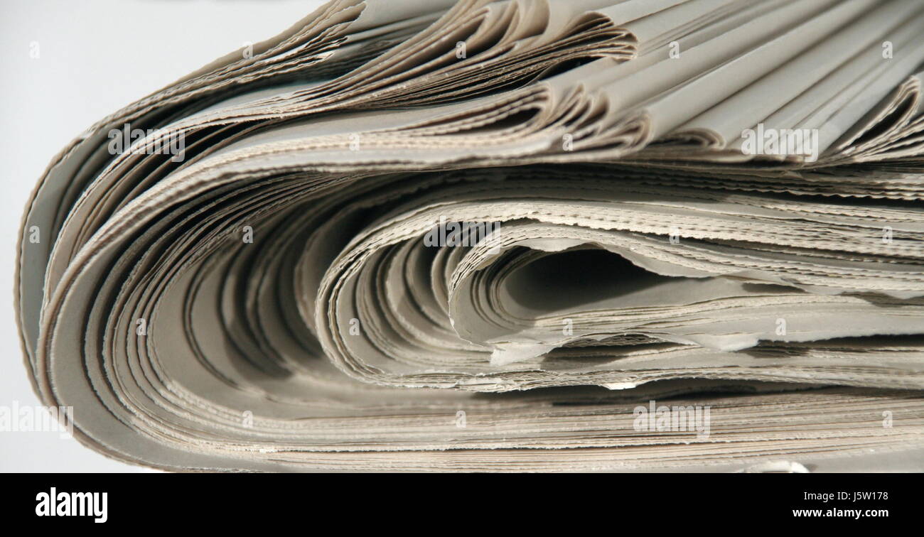 Pile Of Rolled Newspapers