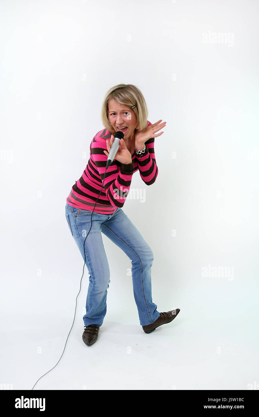 woman lady microphone moderate woman talk speaking speaks spoken speak ...