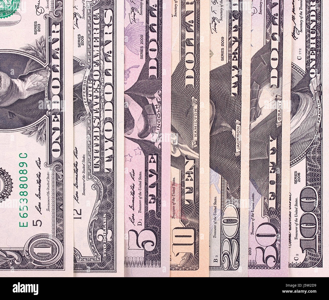 Abstract dollar bills of different denominations background Stock Photo ...
