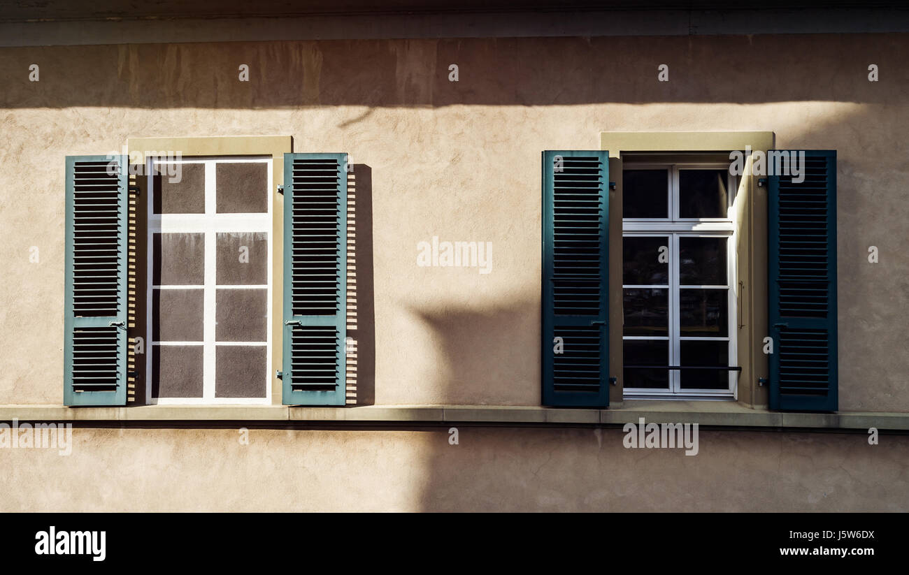 Old classic style windows of Switzerland, renovated house Stock Photo ...