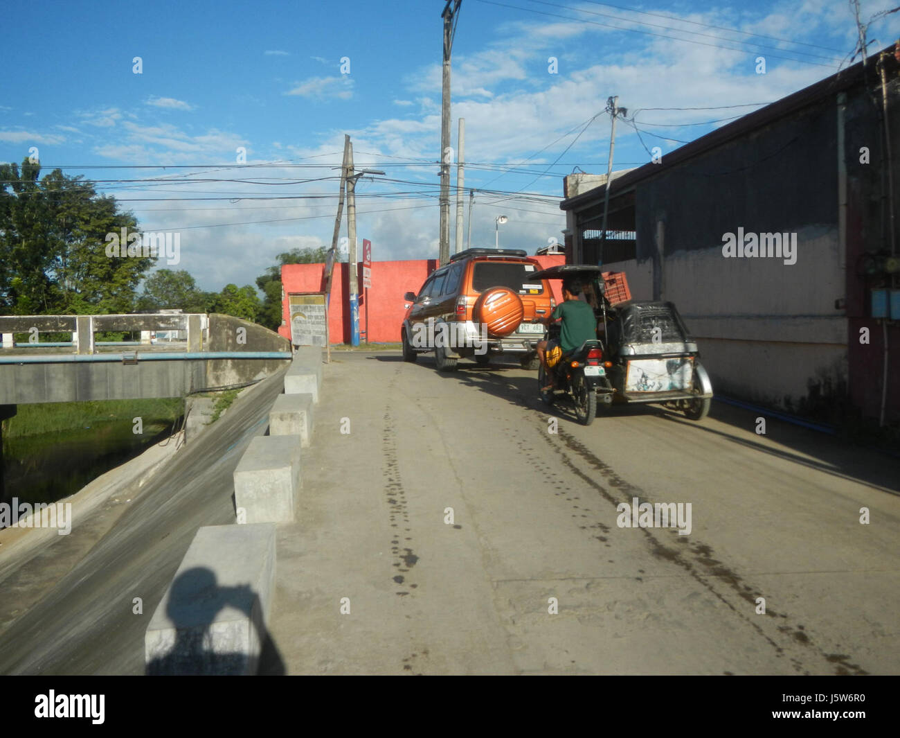 This image shows the Tigpalas Bridge in San Miguel, Bulacan ...