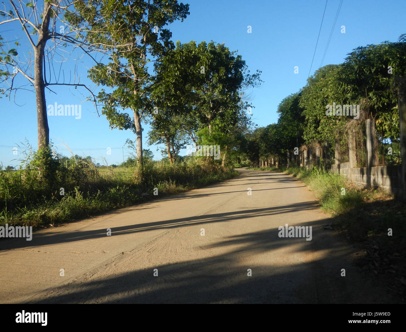 This image depicts the rural landscape of San Rafael, Bulacan, with ...