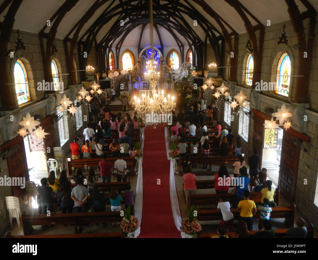 This image captures a wedding ceremony at the Saint Ildephonsus of ...