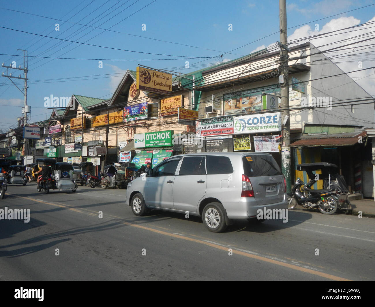 This image depicts the Maharlika Highway in San Juan, Mataas na Parang ...