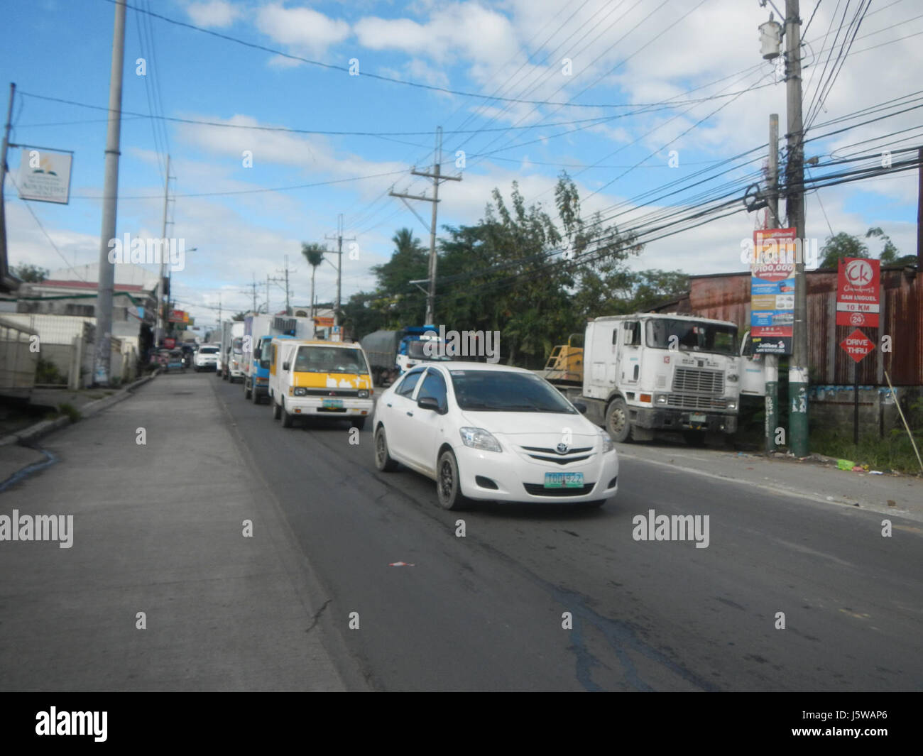 A photograph depicting traffic congestion on Matimbubong Sapang Putol ...