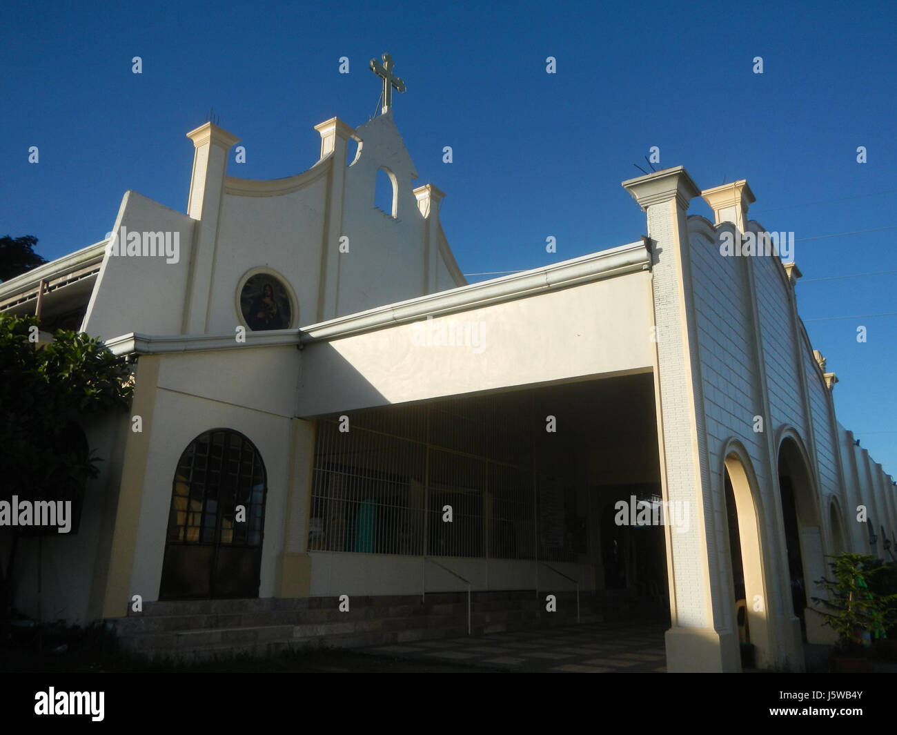 The image captures the rural setting of *San Ildefonso*, Bulacan, with ...