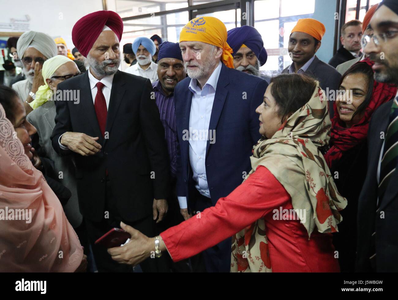 Labour leader Jeremy Corbyn joins worshippers at the Sri Guru Singh ...