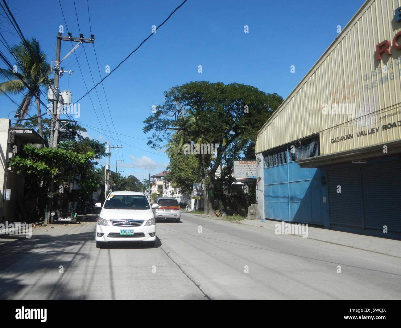 This photo captures a section of the Maharlika Highway passing through ...