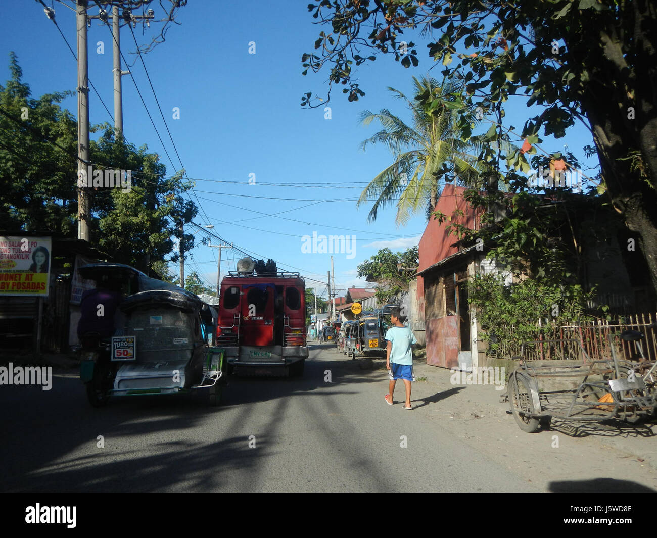 A photograph of the rural roads in Barangays Caingin, Tambubong, Batia ...
