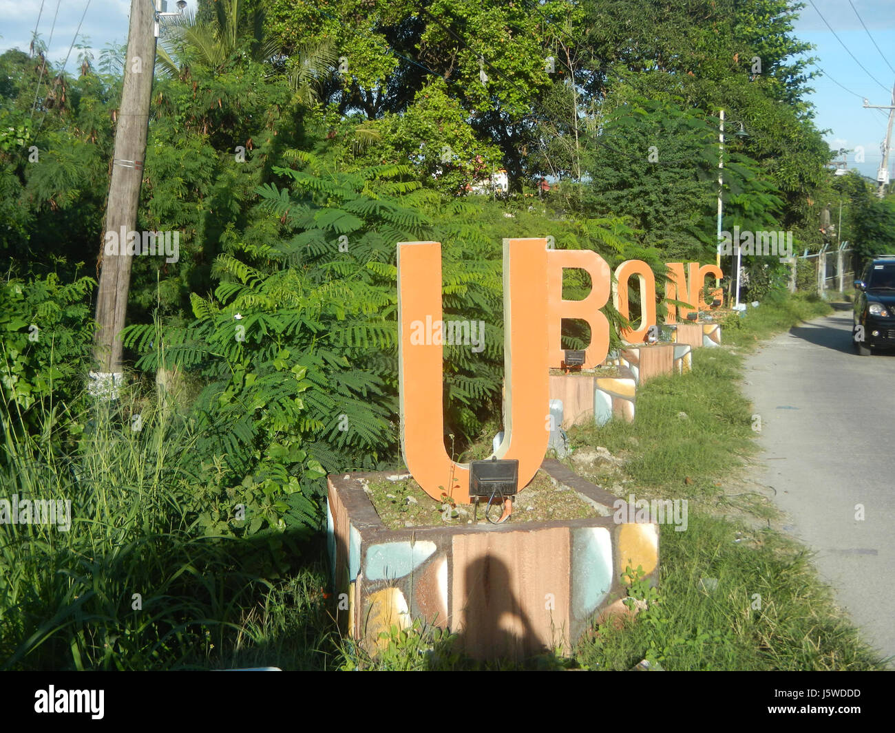 This image showcases the rural fields and roads of Barangays Taal ...