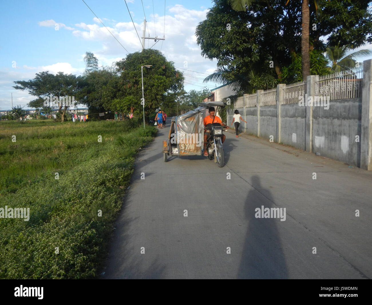 This image depicts the fields and roads of Barangay Batia in Bocaue ...