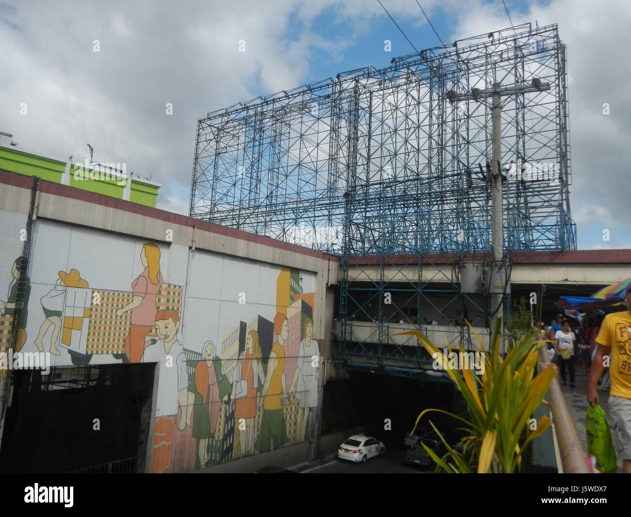 This image showcases a busy intersection in Pasay City, Manila, with ...
