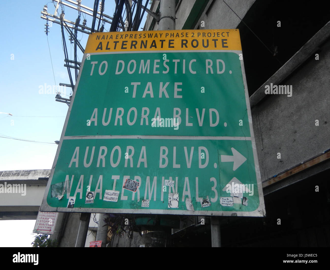 This image captures a busy intersection in Pasay City, Manila, showing ...