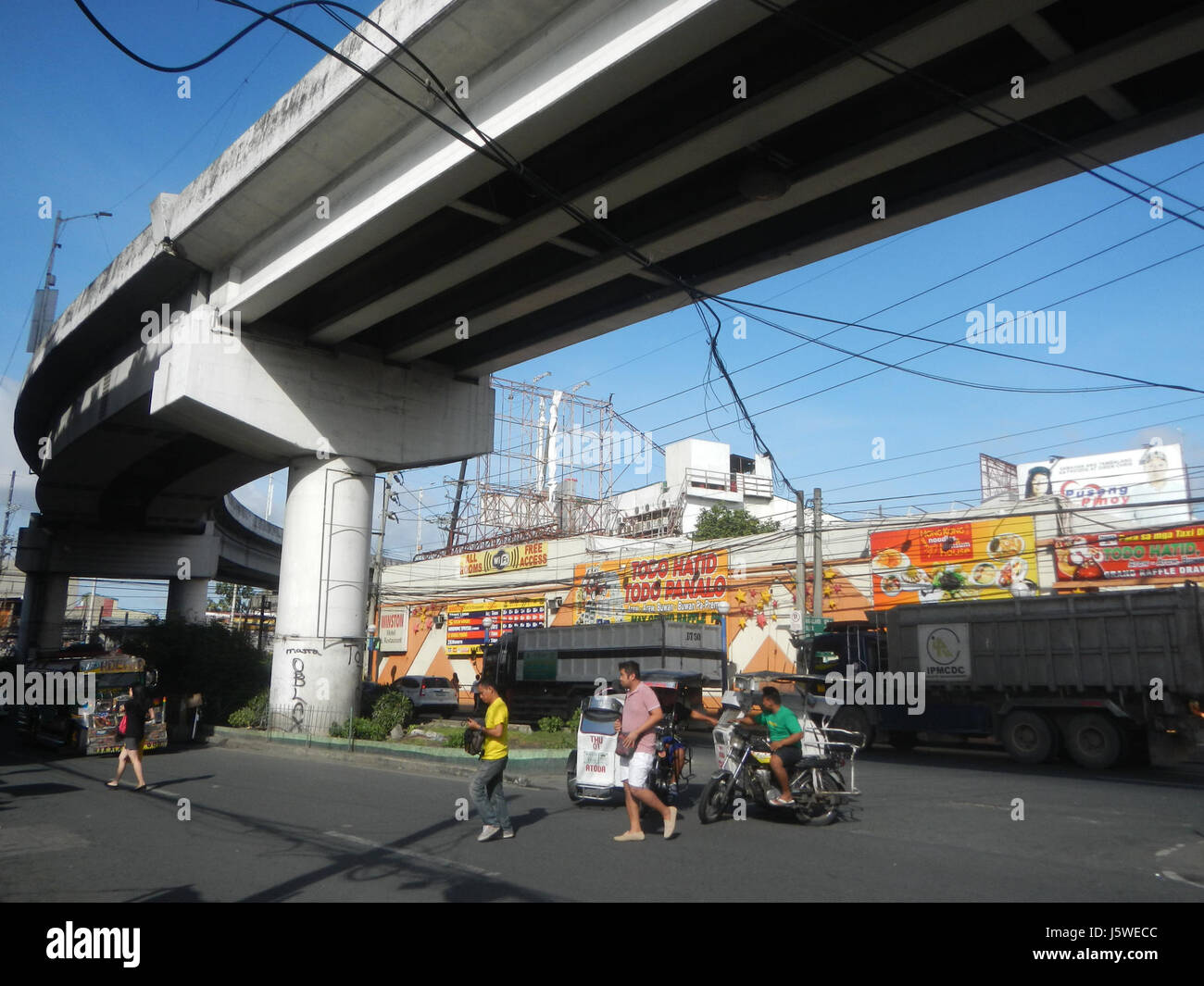 This image shows the EDSA Taft Avenue MRT station and the Tramo flyover ...