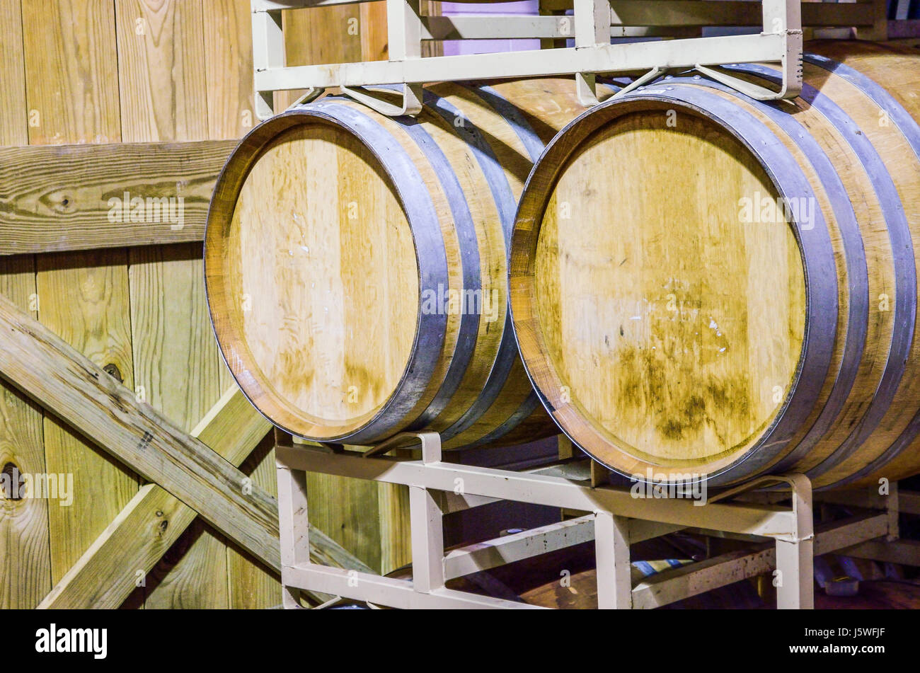 Two large wooden wine barrels laying in underground cellar Stock Photo ...