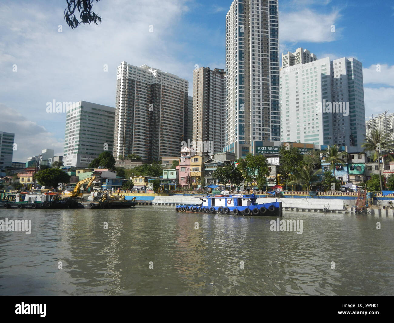 This area along the Pasig River, stretching across Mandaluyong, Makati ...