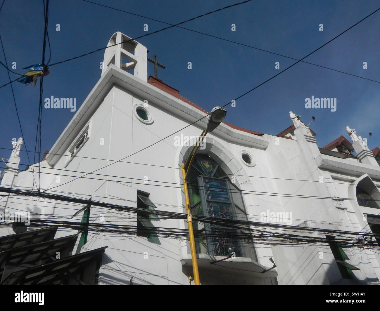 This image depicts the Saint John Mary Vianney Parish Church located in ...