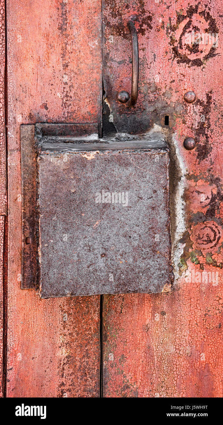 old rusty metal background with a box lock. The vertical frame Stock ...