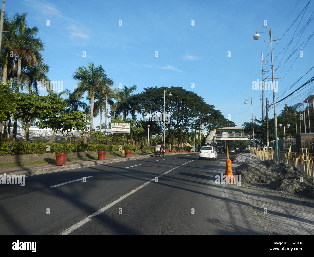 This area in West Rembo, Makati City, features old trees and ...