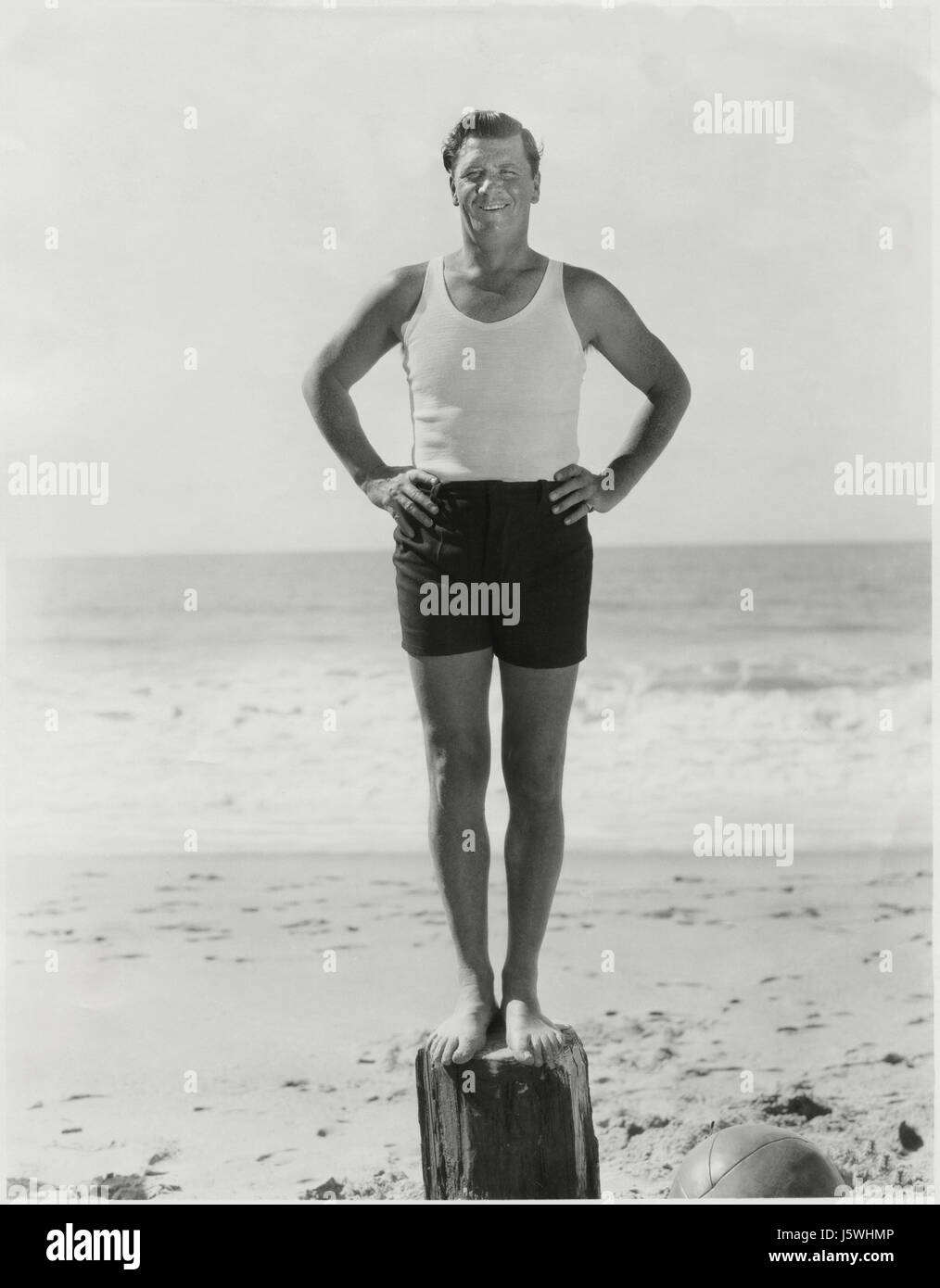 Actor George Bancroft, Portrait Standing on Wood Post at Beach, Santa ...