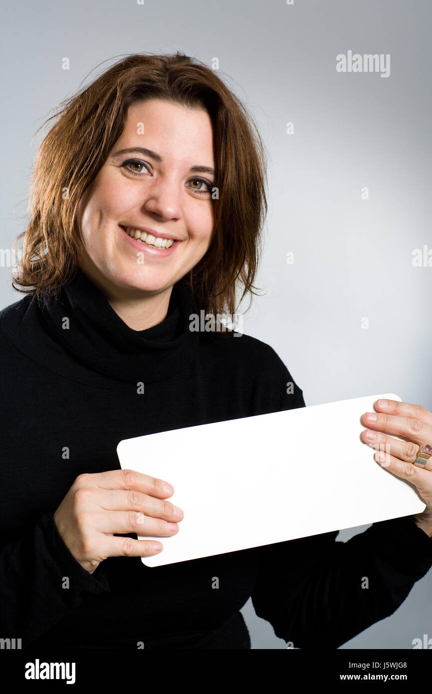 woman indicate show hold card area of freedom shield empty woman laugh laughs Stock Photo - Alamy