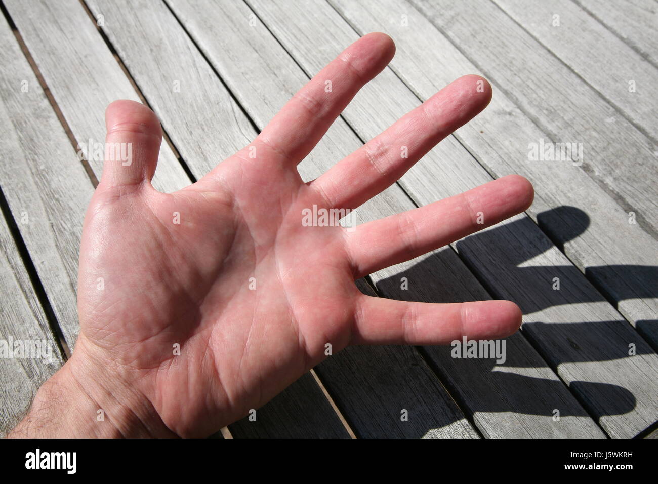 Mens hand hi-res stock photography and images - Alamy