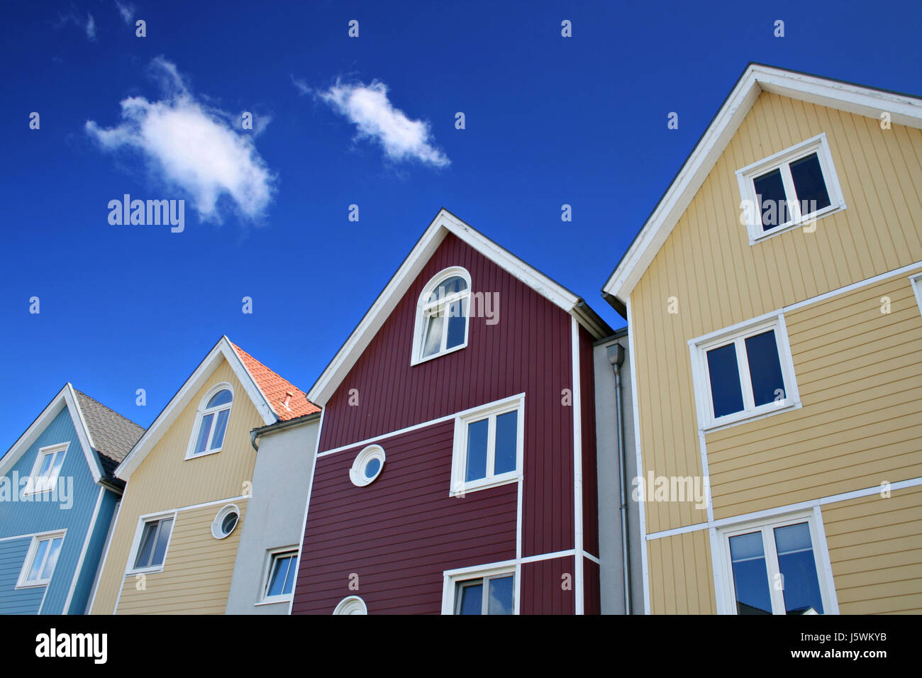 brightly colored houses facade Stock Photo - Alamy