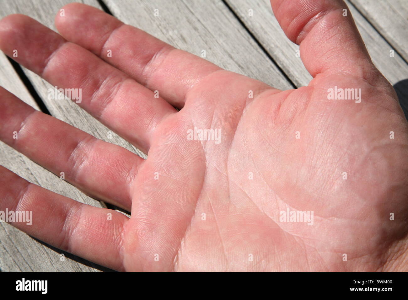 Mens palm hi-res stock photography and images - Alamy