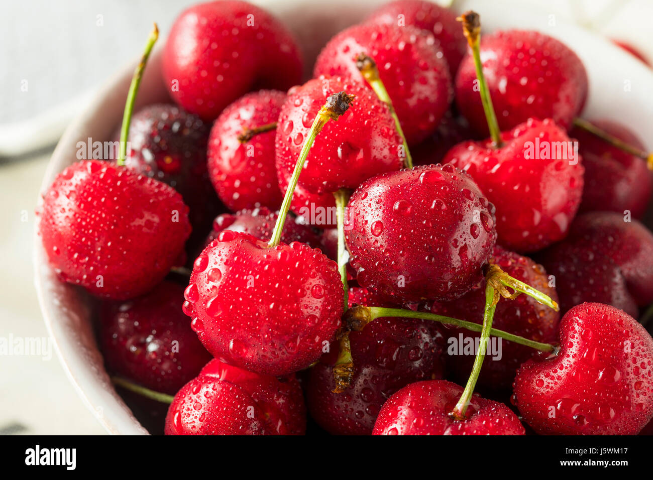Raw Organic Red Sweet Cherries in a Bowl Stock Photo - Alamy