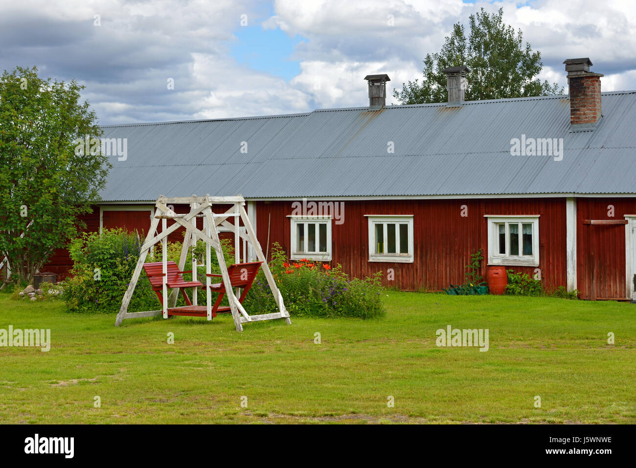 Traditional old rural house with swings. Finland, Lapland Stock Photo ...