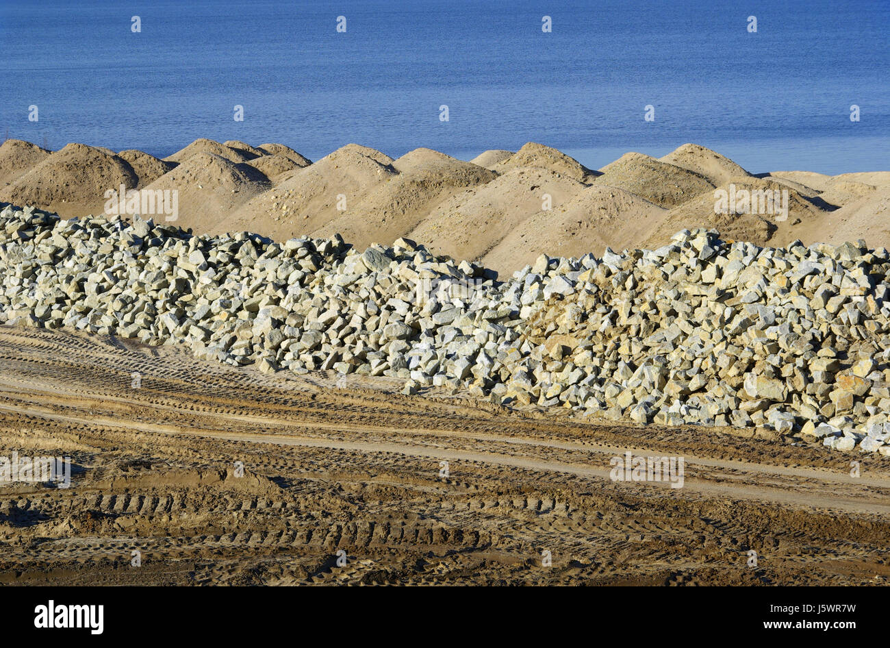 stone wall heap pile sands sand construction site stone rock wall ...