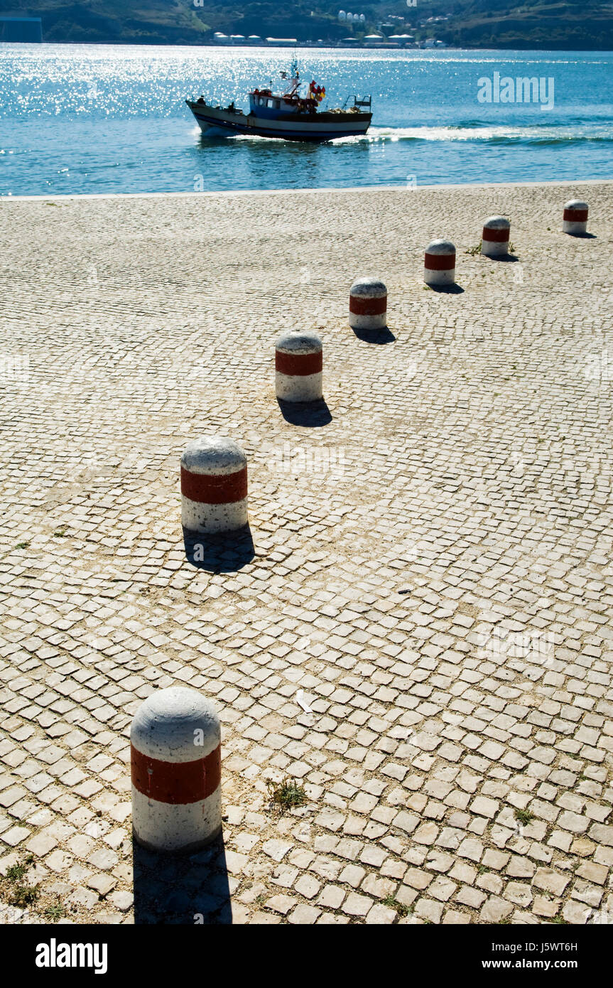 blue harbor fishing boat cobblestone waterfront river water rowing boat ...