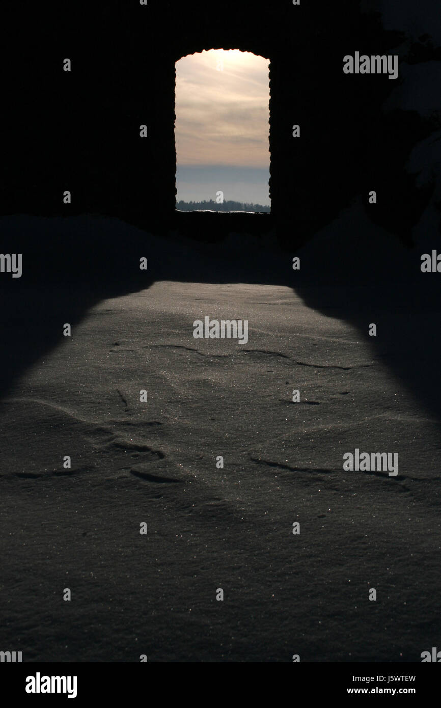 winter window porthole dormer window pane ruin blink snow clouds shine ...