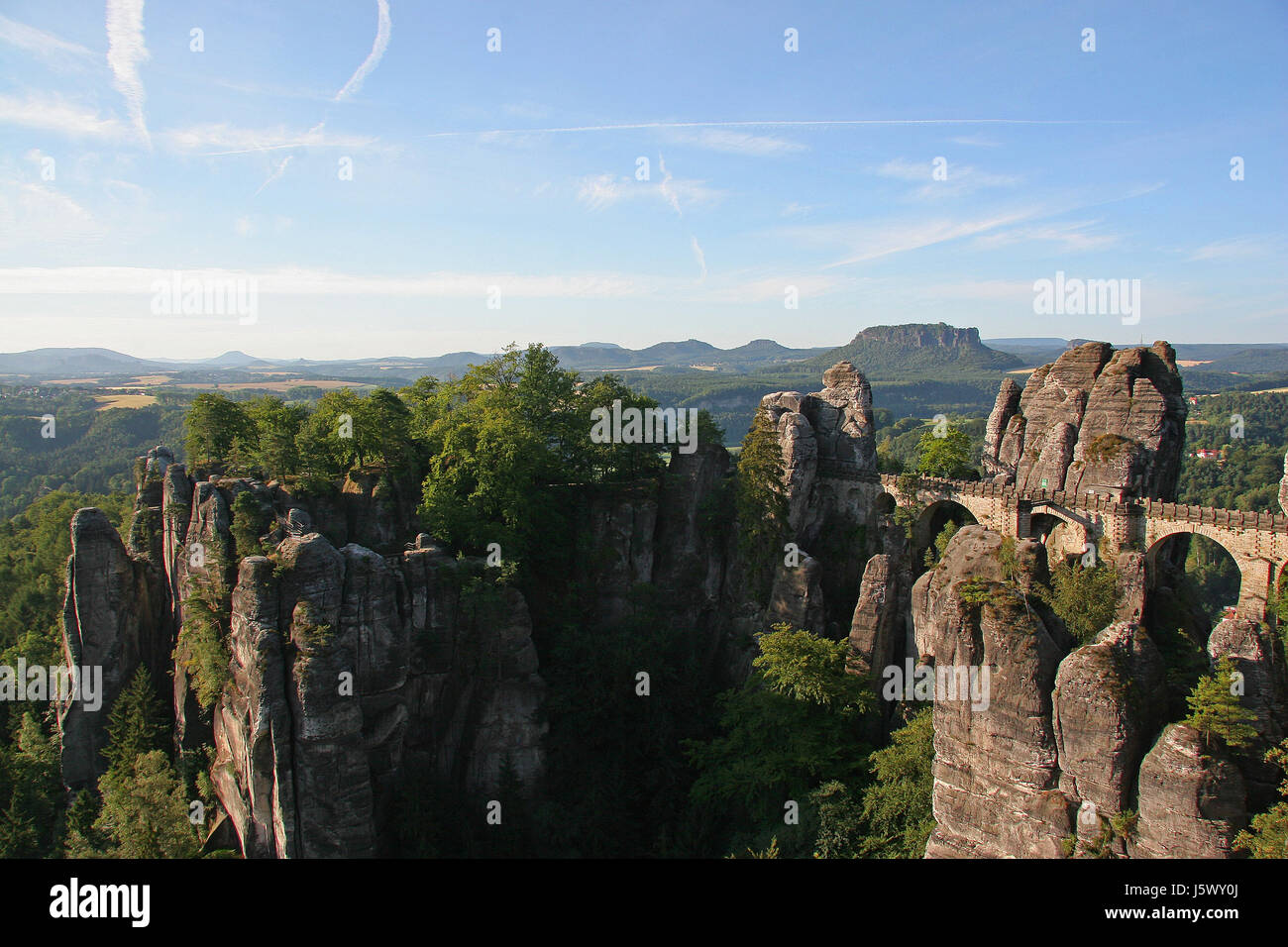 bridge rock saxony mountain scenery countryside nature blue tree trees ...