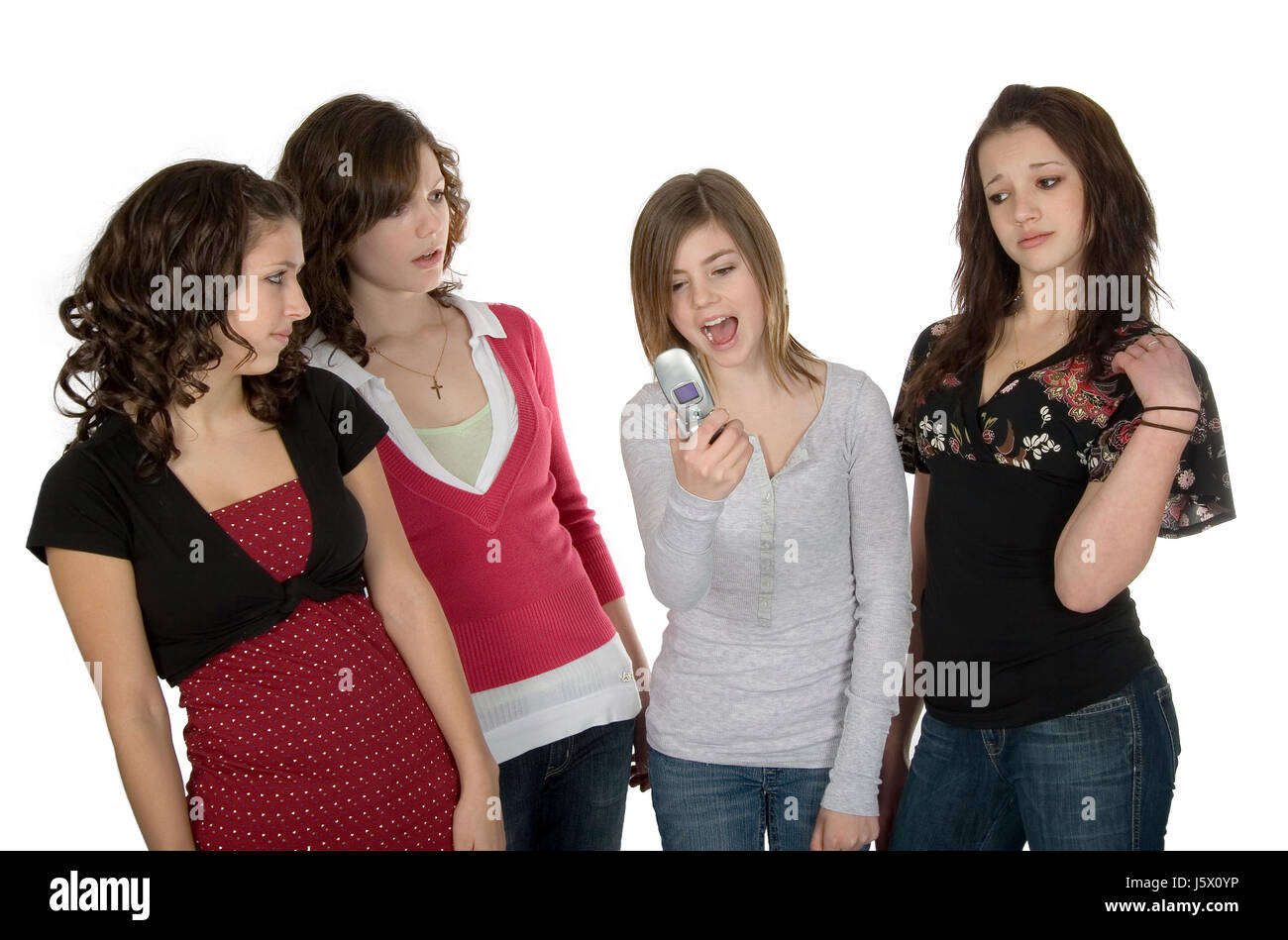 Angry teenage girl mobile phone Cut Out Stock Images & Pictures - Alamy