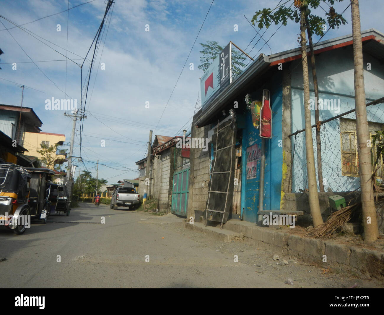 This photograph shows a bridge on the Cojuanco Rizal Road in the ...