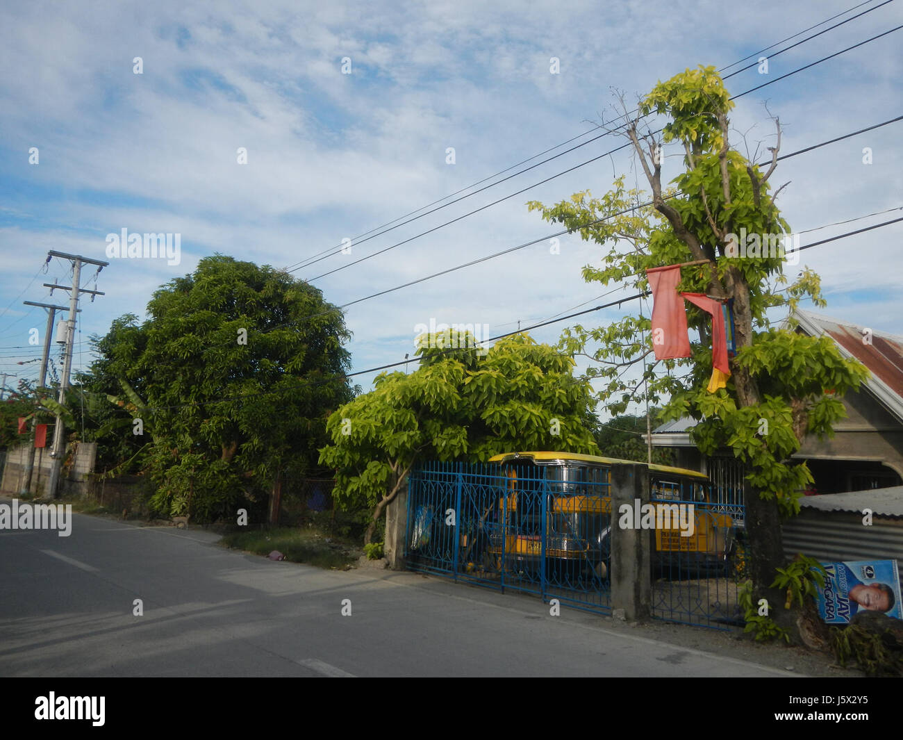 This photograph depicts the Sumacab Bridge Road in Cabanatuan City ...