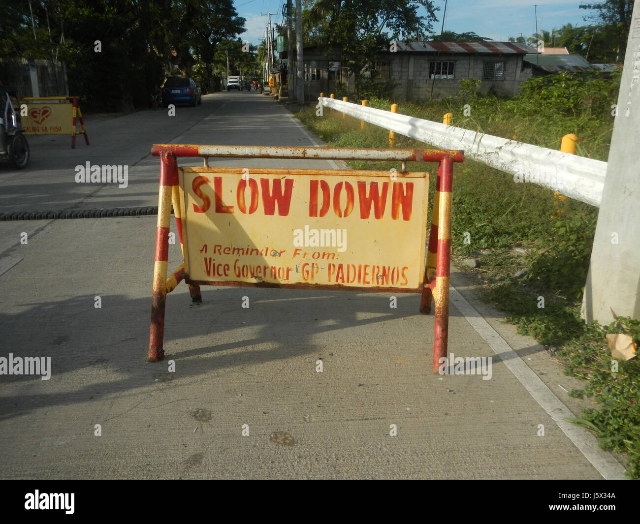 This photograph showcases the expansive paddy fields and grasslands of ...