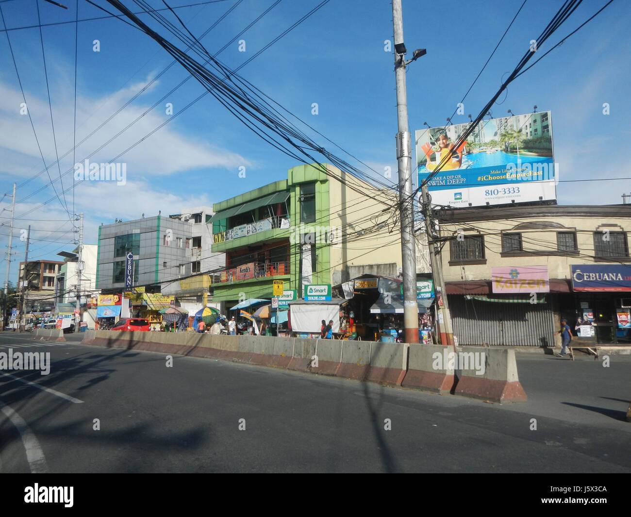 The Amang Rodriguez Avenue in Manila, Philippines, is a major ...