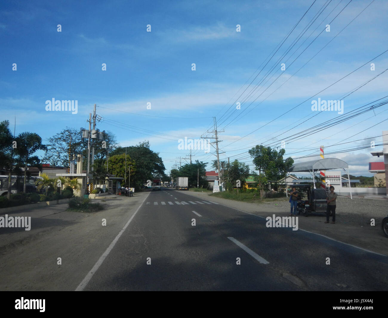 This image depicts a section of the Maharlika Highway in San Vicente ...