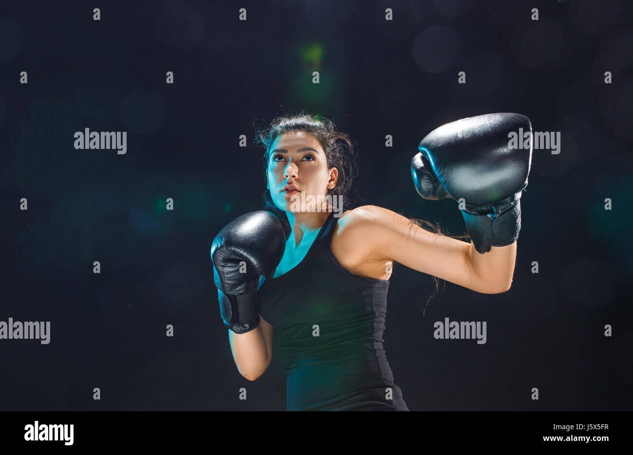 Muscular black female boxer punch hi-res stock photography and images ...