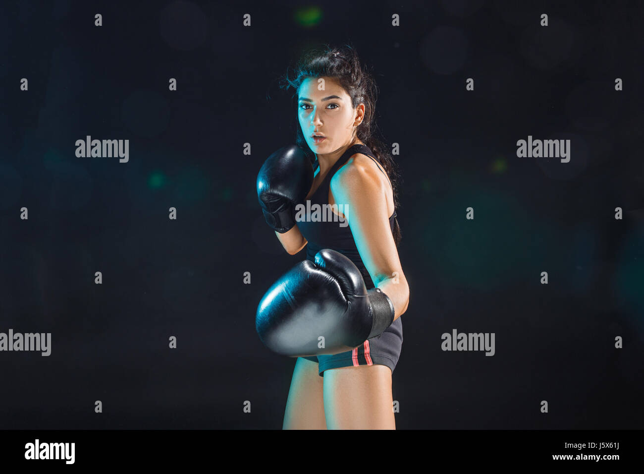 Muscular black female boxer punch hi-res stock photography and images ...